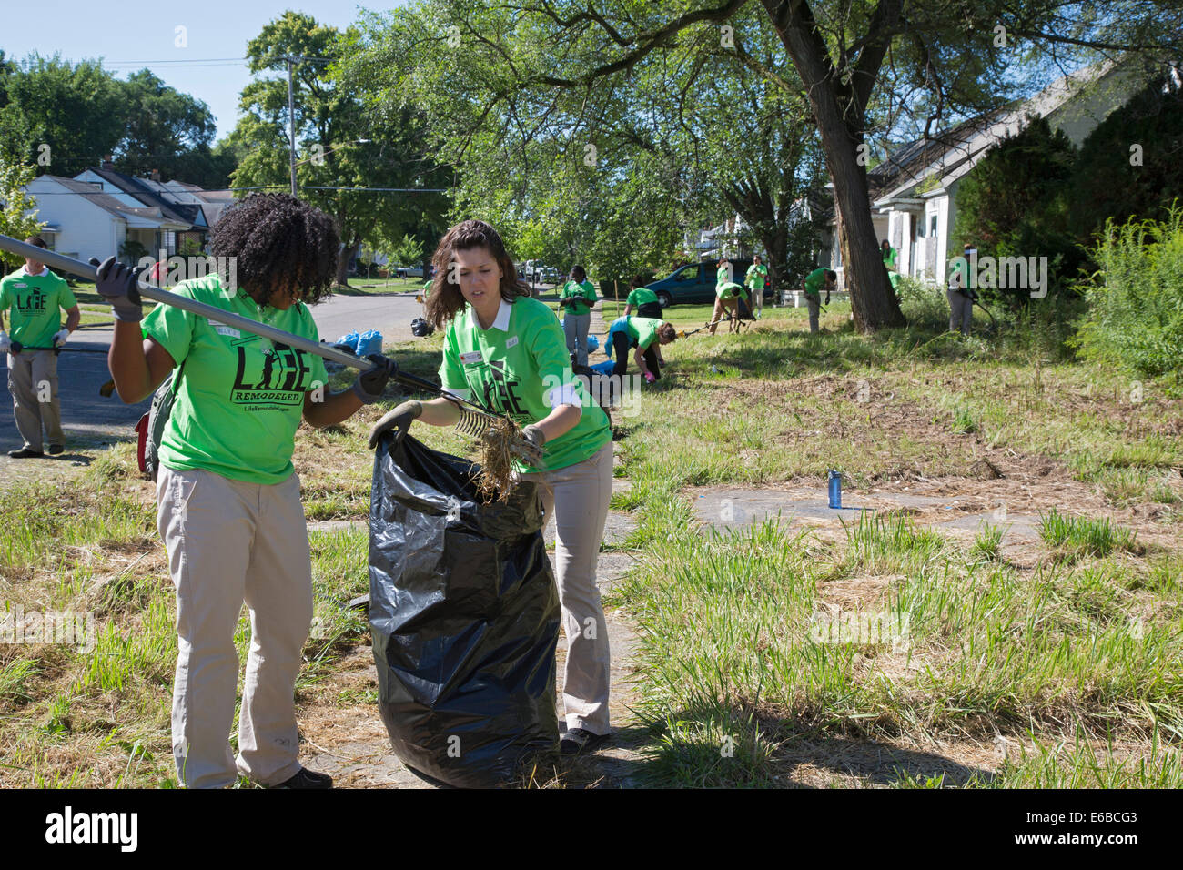 Detroit, Michigan - Volunteers clean up a distressed neighborhood ...