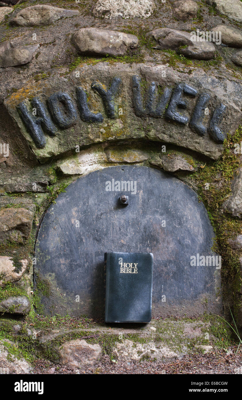 Traditional Holy Well detail and bible Stock Photo - Alamy