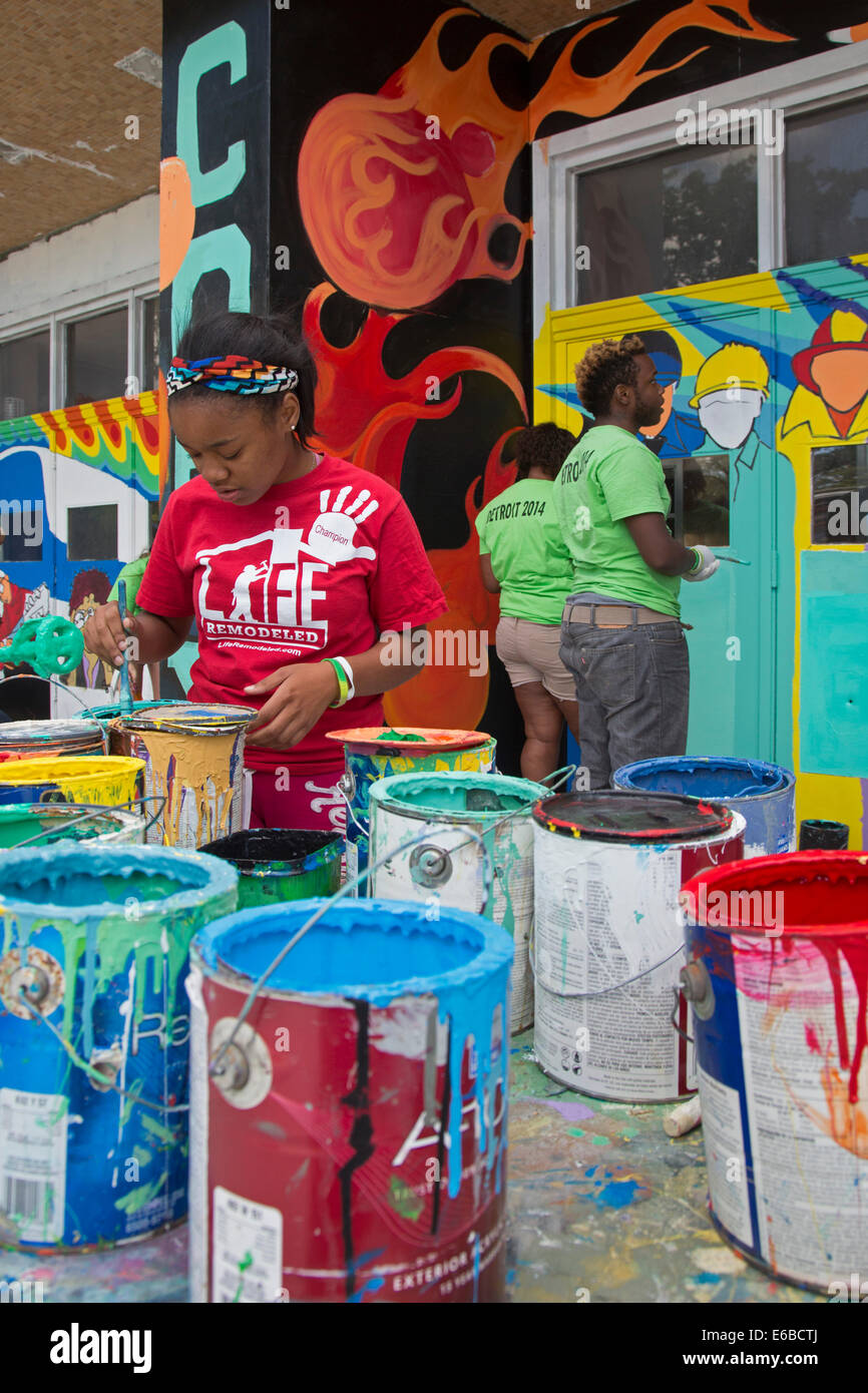 Detroit, Michigan - Volunteers paint the entrance to Cody High School ...