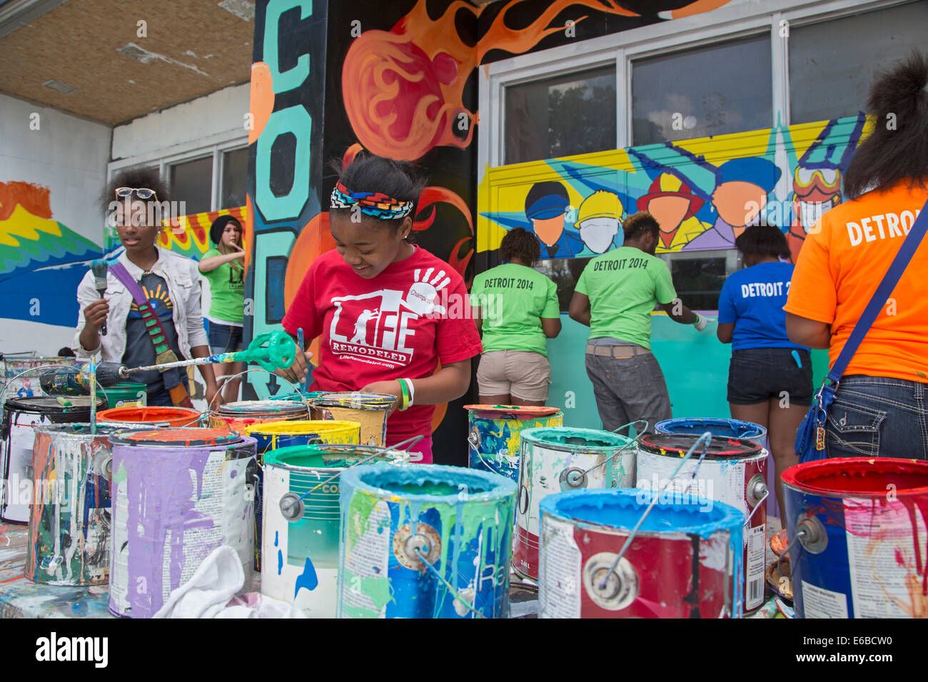 Detroit, Michigan - Volunteers paint the entrance to Cody High School ...