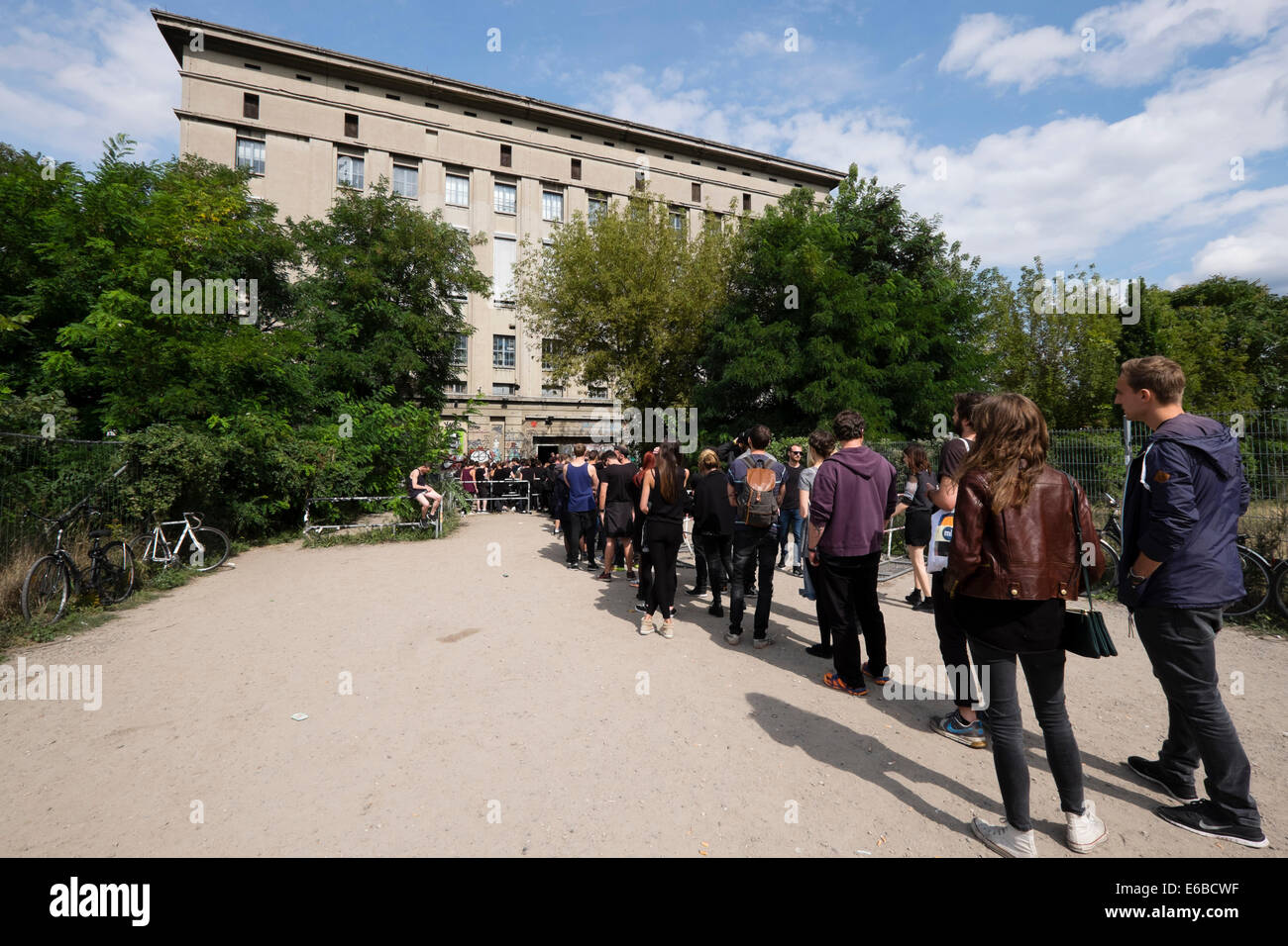 Clubbers queuing outside infamous Berghain nightclub on a Sunday ...