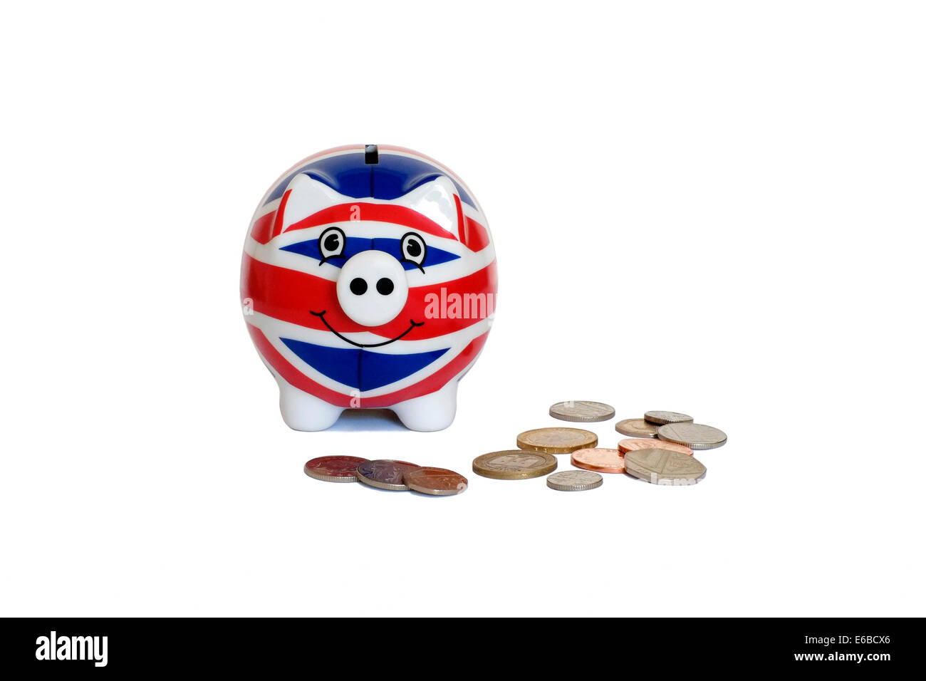 piggy bank with union jack design and uk coins Stock Photo - Alamy