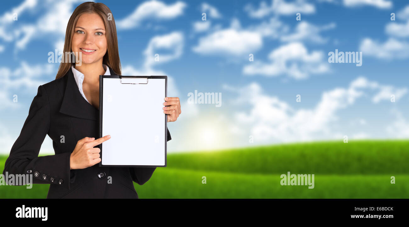 Businesswoman holding paper holder Stock Photo - Alamy