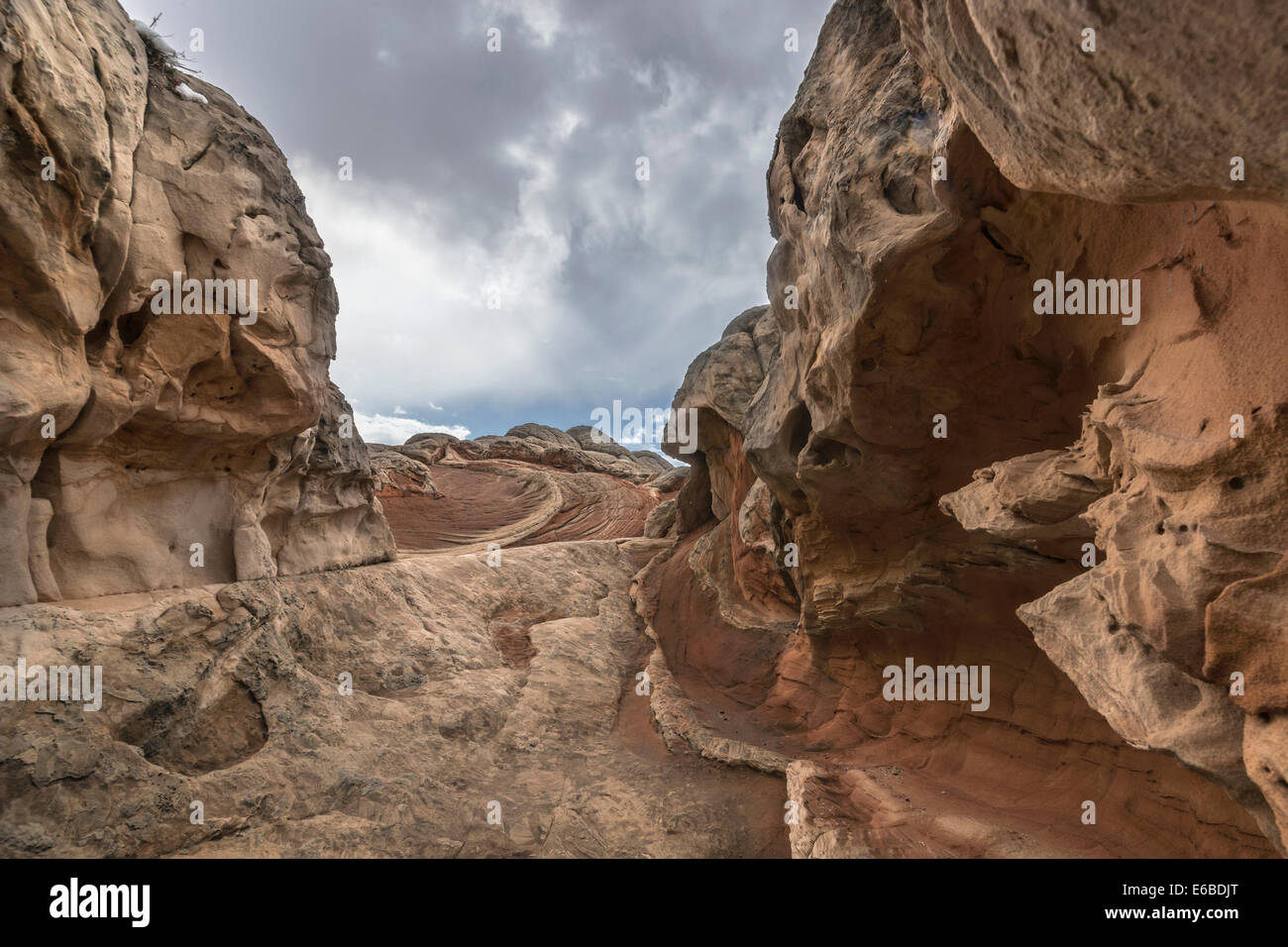 Sandstone formations with wave formation in the background, White ...