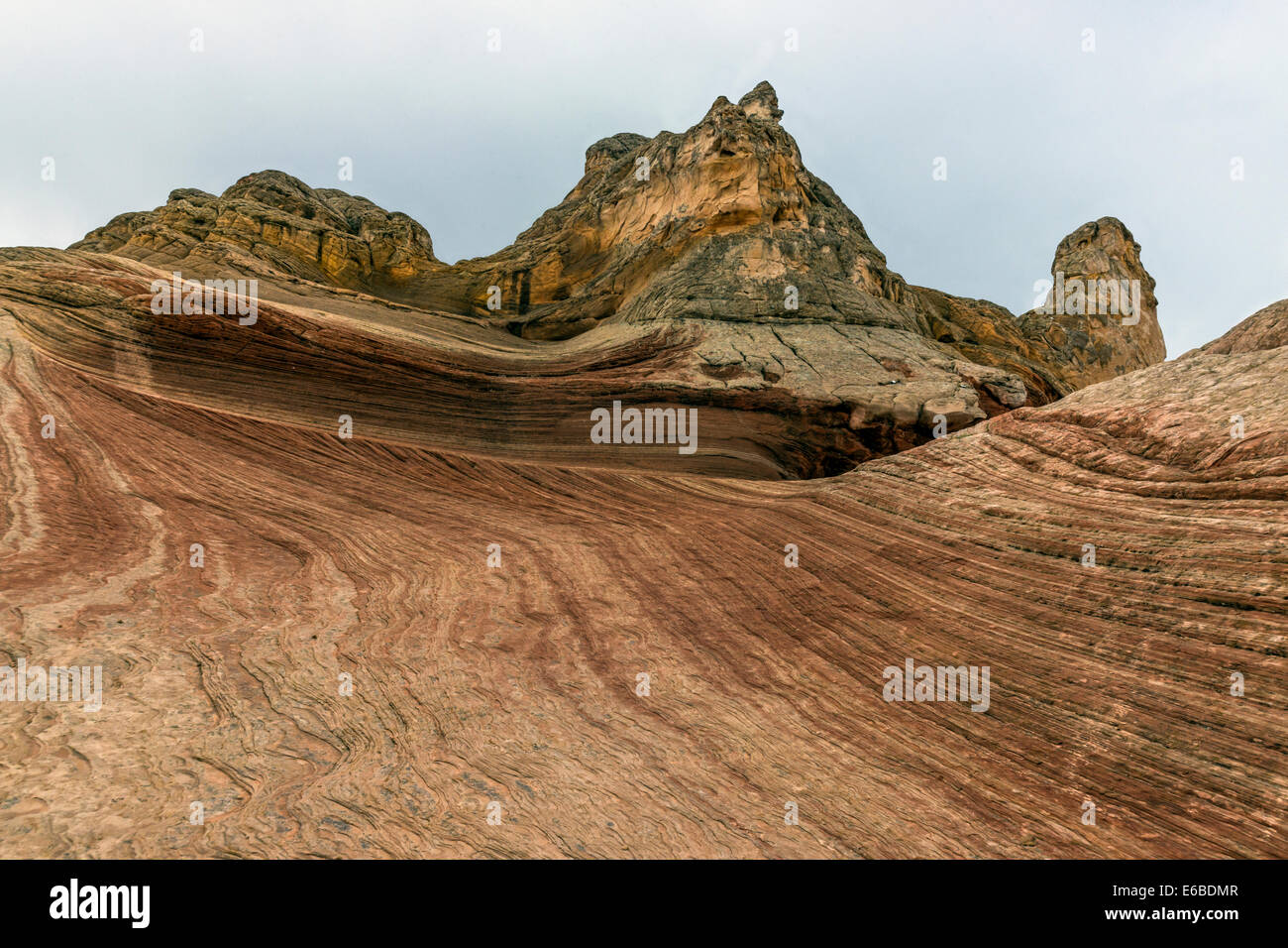 White, red and yellow sandstone with cap stone and striations, White ...