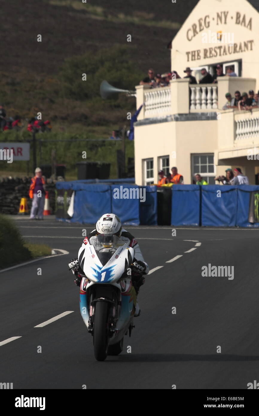 John McGuiness riding the Mugen electric motorcycle at Creg ny Baa ...