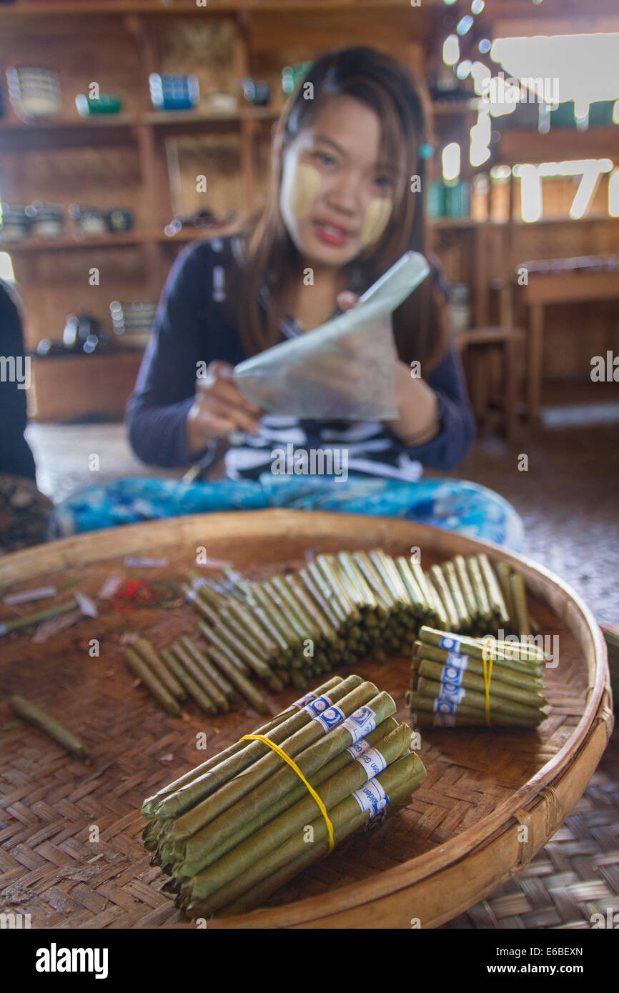 Burmese Myanmar Woman Making Cheroot Stock Photos & Burmese Myanmar ...