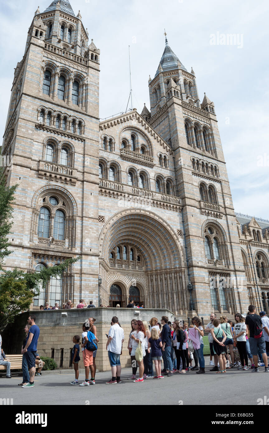 Visitors queuing outside the main entrance to the Natural History ...