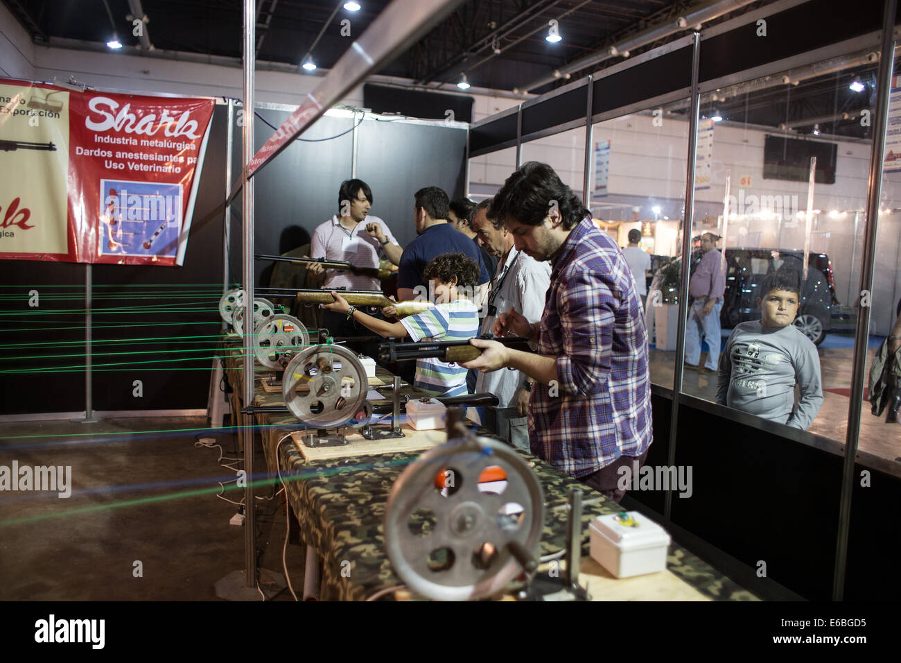 Buenos Aires, Argentina. 19th Aug, 2014. Visitors practice target ...