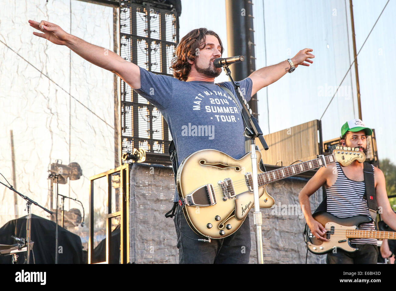 Red electric guitar played hi-res stock photography and images - Alamy