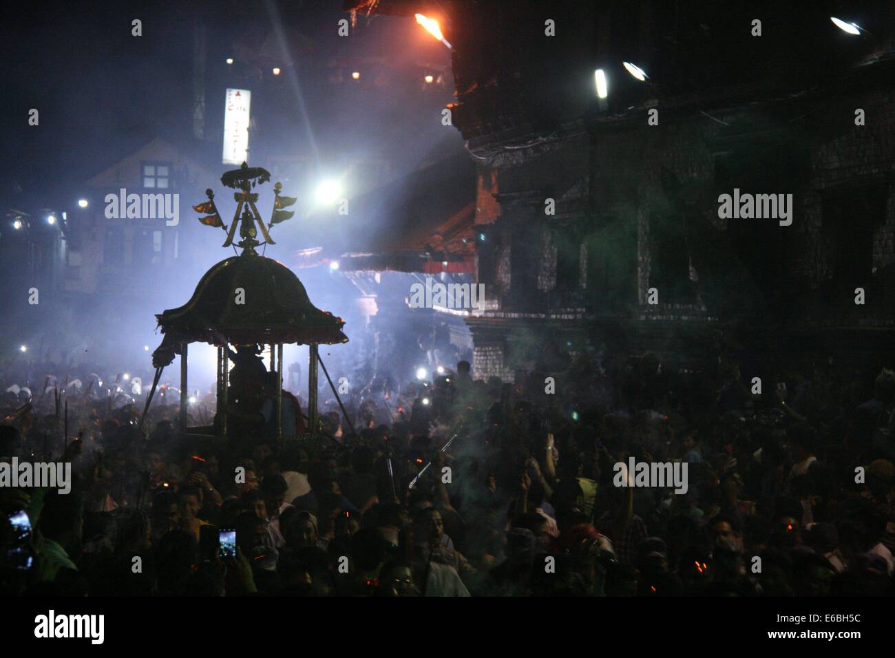 Lalitpur, Nepal. 19th Aug, 2014. Hindu devotees carry the chariot of ...