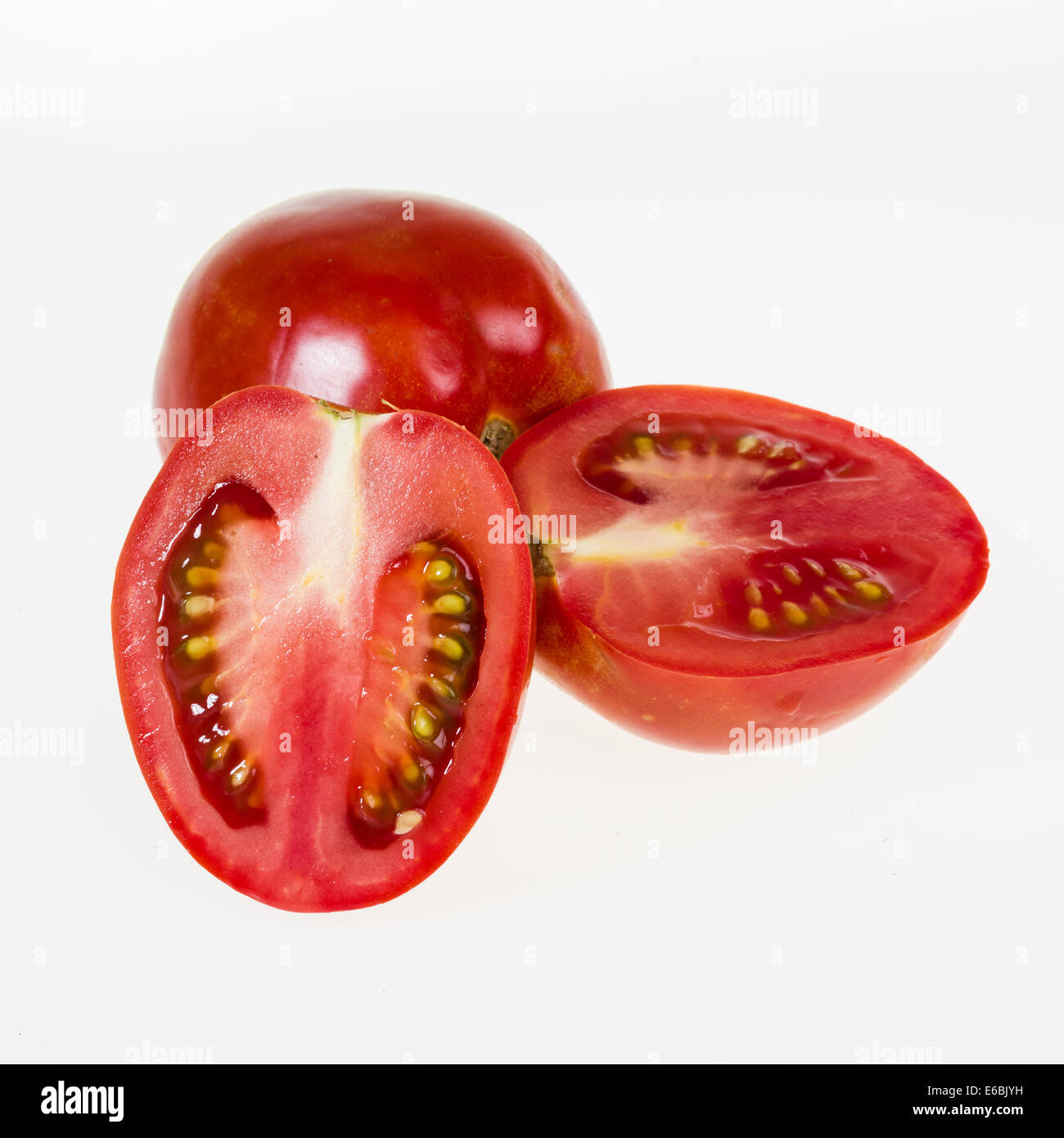 Red ripe paste tomatoes isolated on white Stock Photo - Alamy