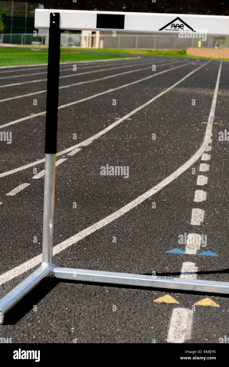 Hurdles On A Black Track