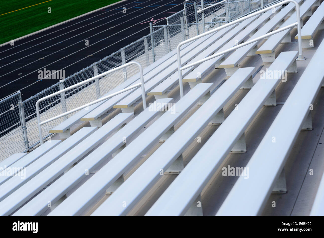 outdoor black running track and bleachers Stock Photo - Alamy