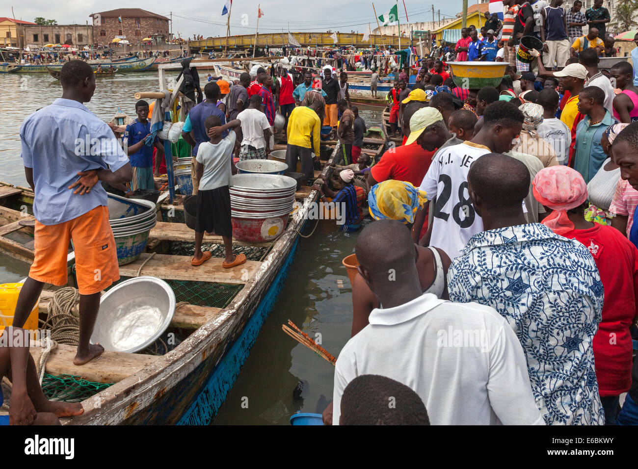 Unloading fish at the market Elmina, Gold Coast, Ghana, Africa Stock ...