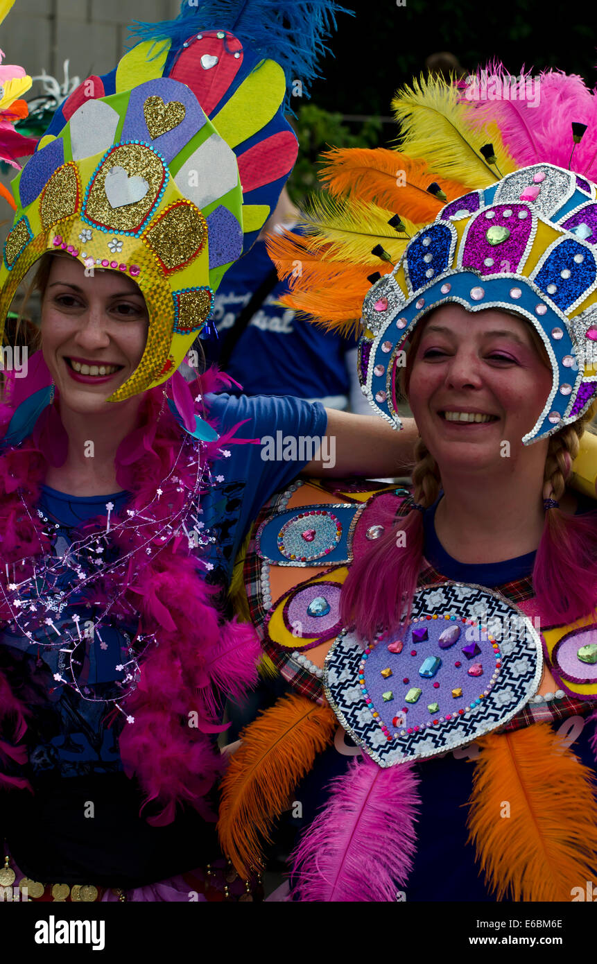 2 women in exotic costumes posing at the Carnival, part of Edinburgh's ...