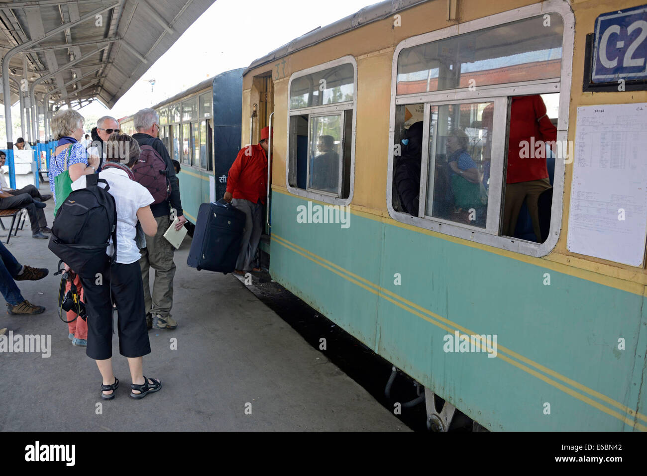 Tourists boarding the Himalayan Queen train at Kalka railway station in ...