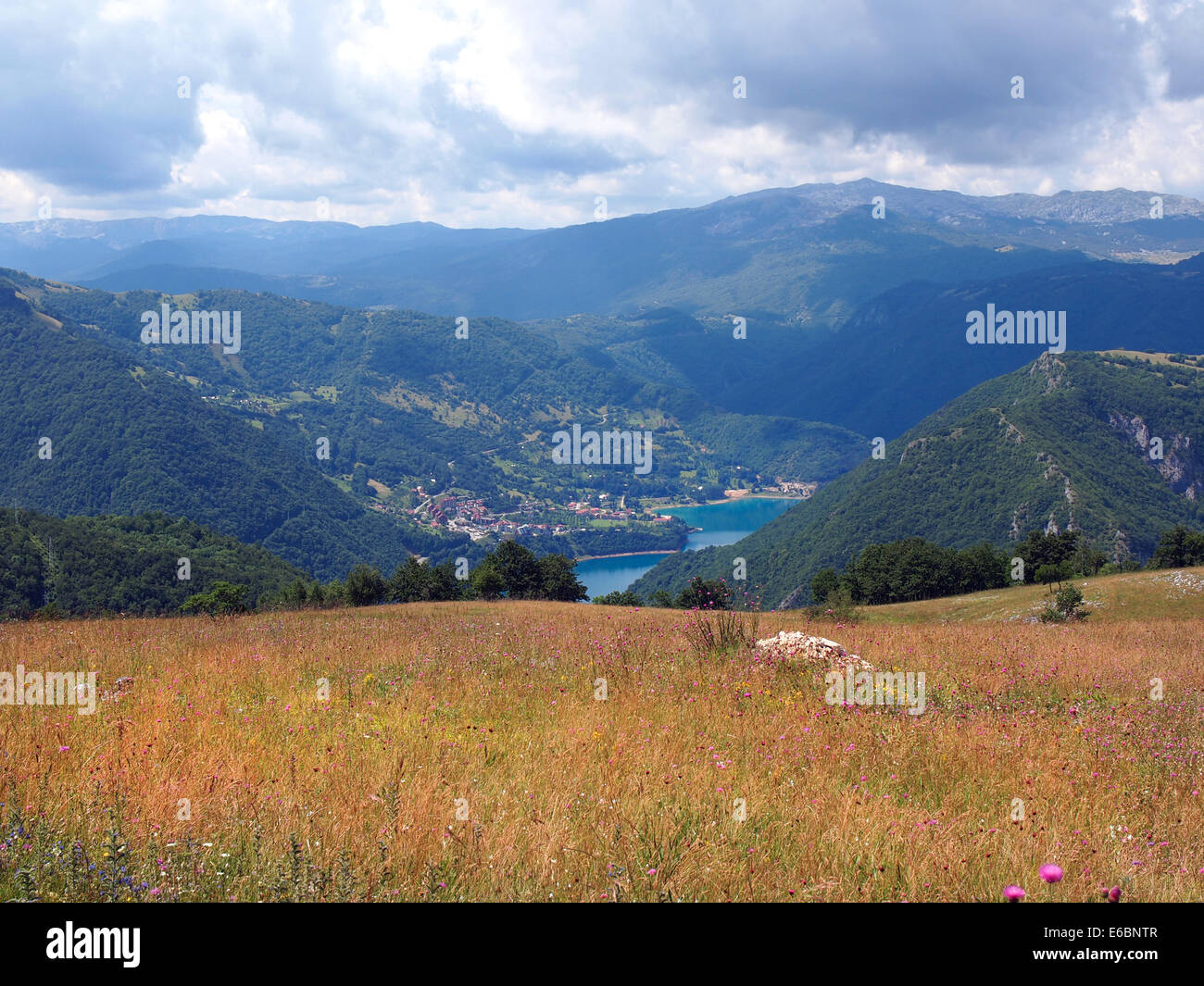 blue lake under the high mountains Stock Photo - Alamy