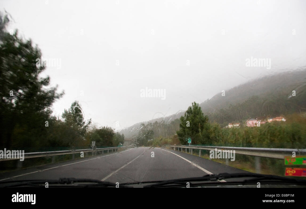 Rain drops on car windshield in a storm Stock Photo - Alamy