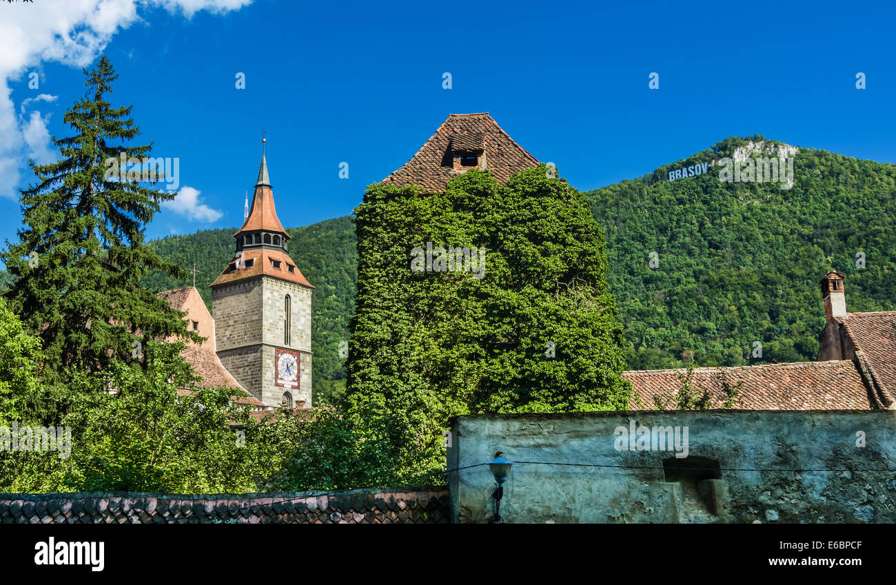 View above the red medieval tiled roofs close up, in the old center of ...