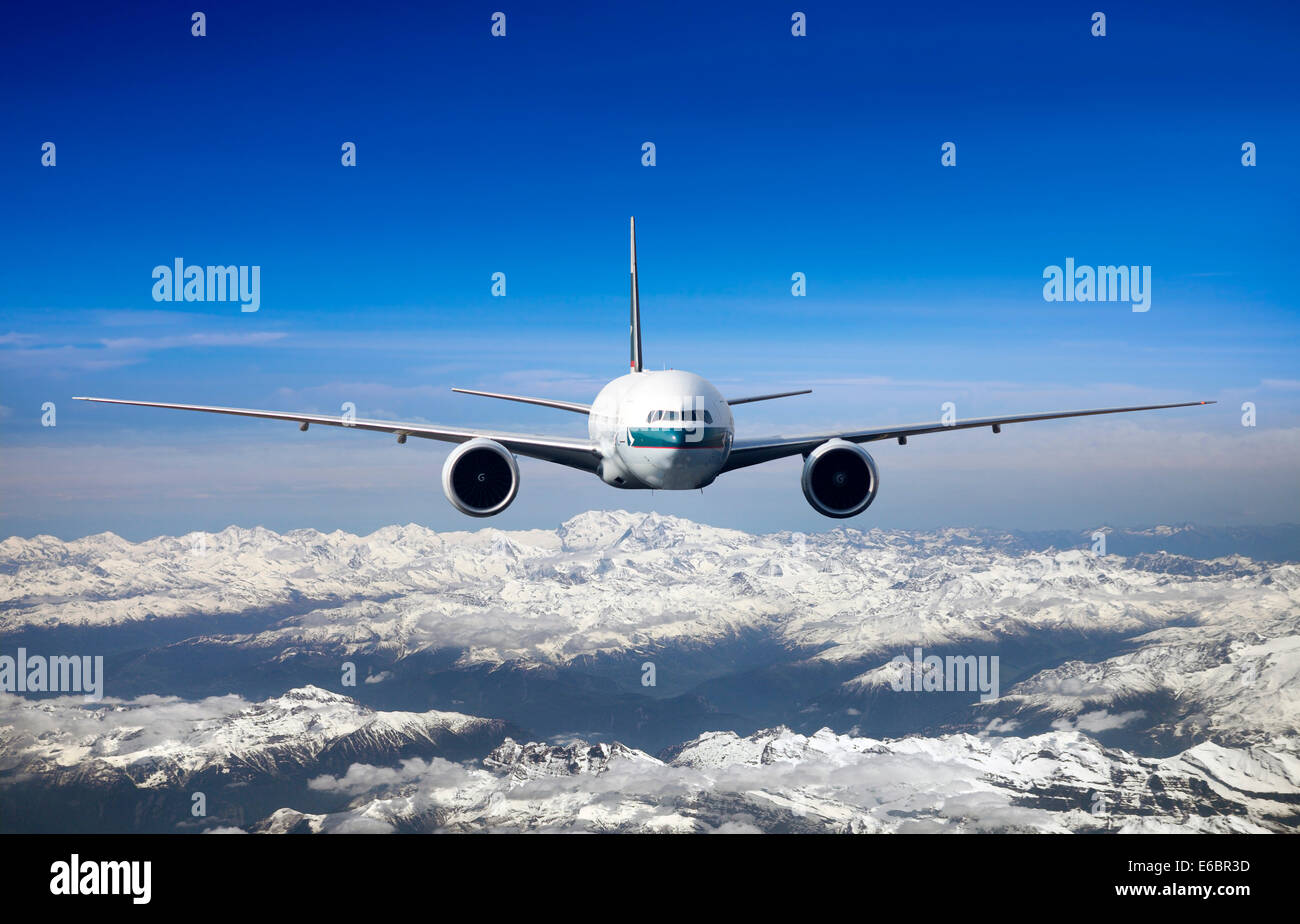 Passenger in plane view over mountains hi-res stock photography and ...