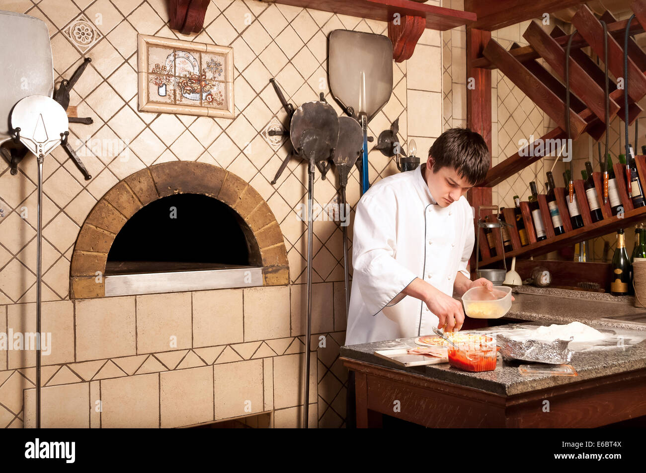 Male making pizza in hi-res stock photography and images - Alamy
