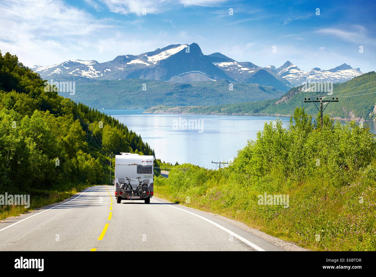 Norvegian landscape with white motorhome on the E6 road highway, Norway ...