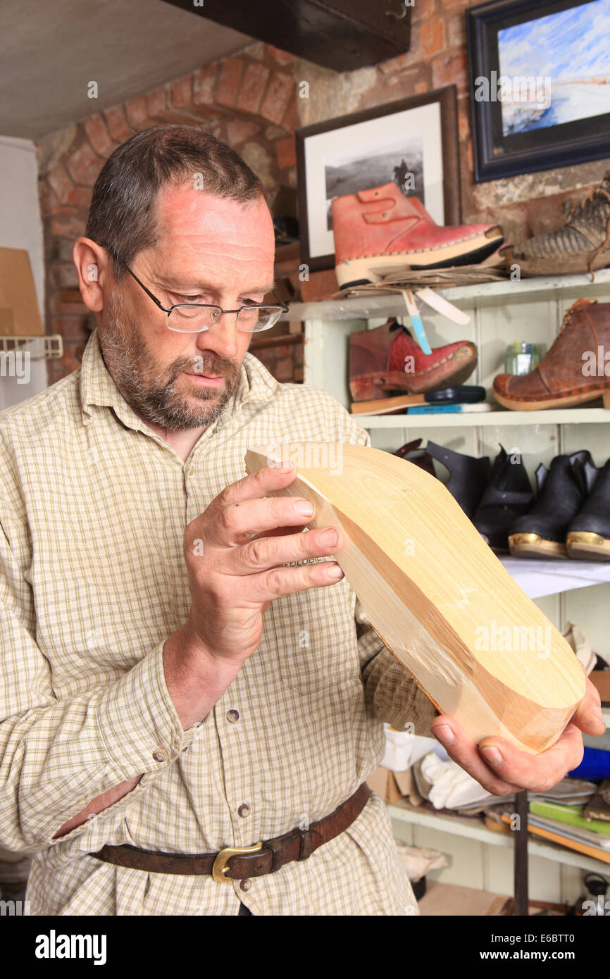 Jeremy Atkinson making Clogs in his workshop at Kington in ...