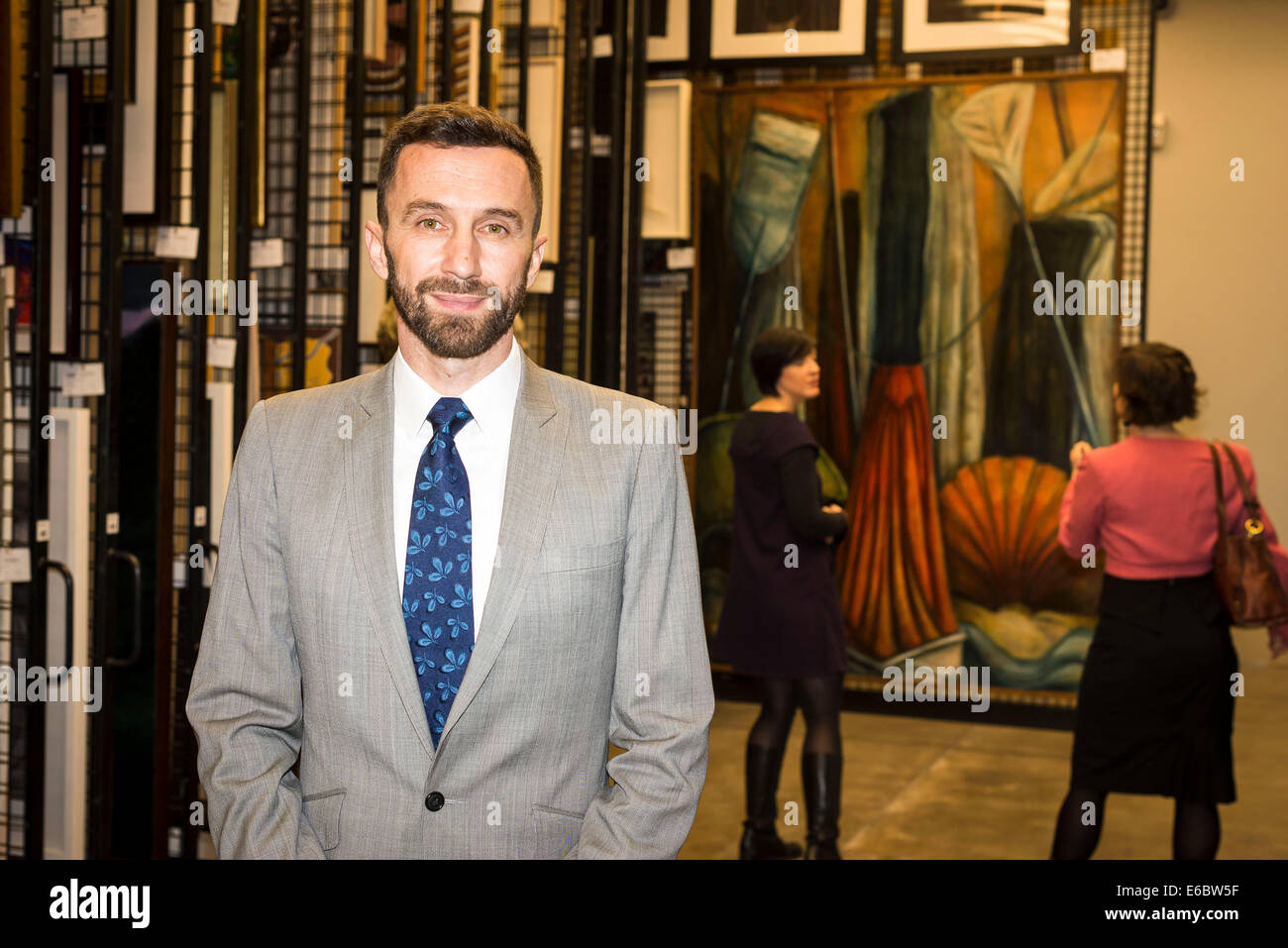 Artbank director Tony Stephens poses following the official opening of ...