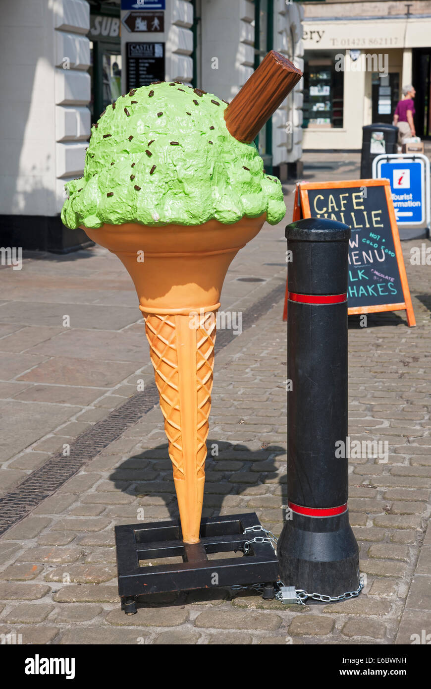 Large plastic ice cream cone advertising outside cafe shop store ...