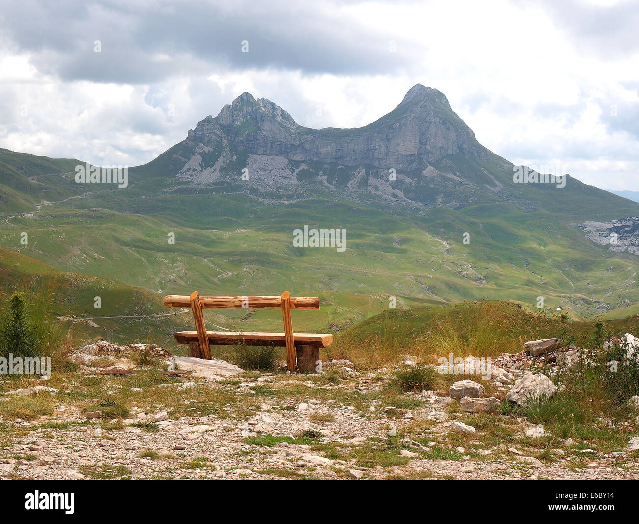 Outdoor bench in a nice mountain area Stock Photo - Alamy