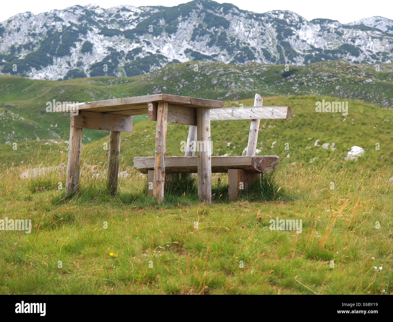 Outdoor bench in a nice mountain area Stock Photo - Alamy