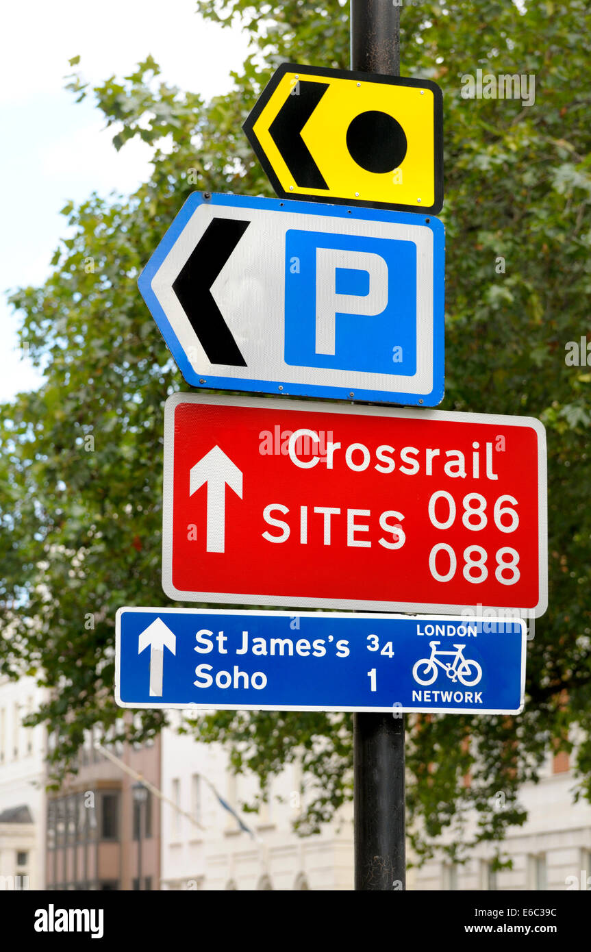 London, England, UK. Road signs in Grosvenor Square: parking; crossrail ...