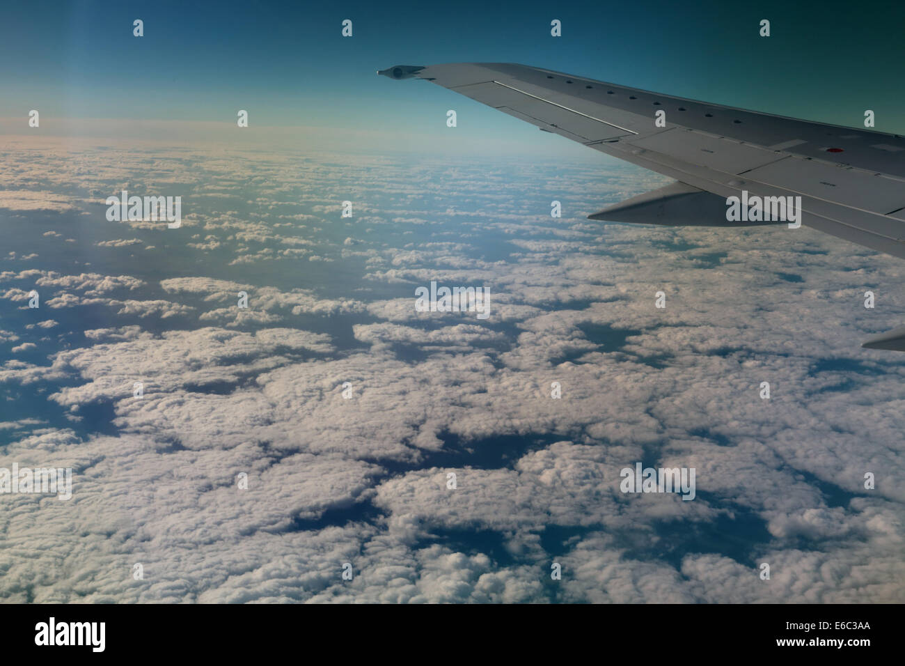View from window of a jet plane wing with beautiful weather Stock Photo ...