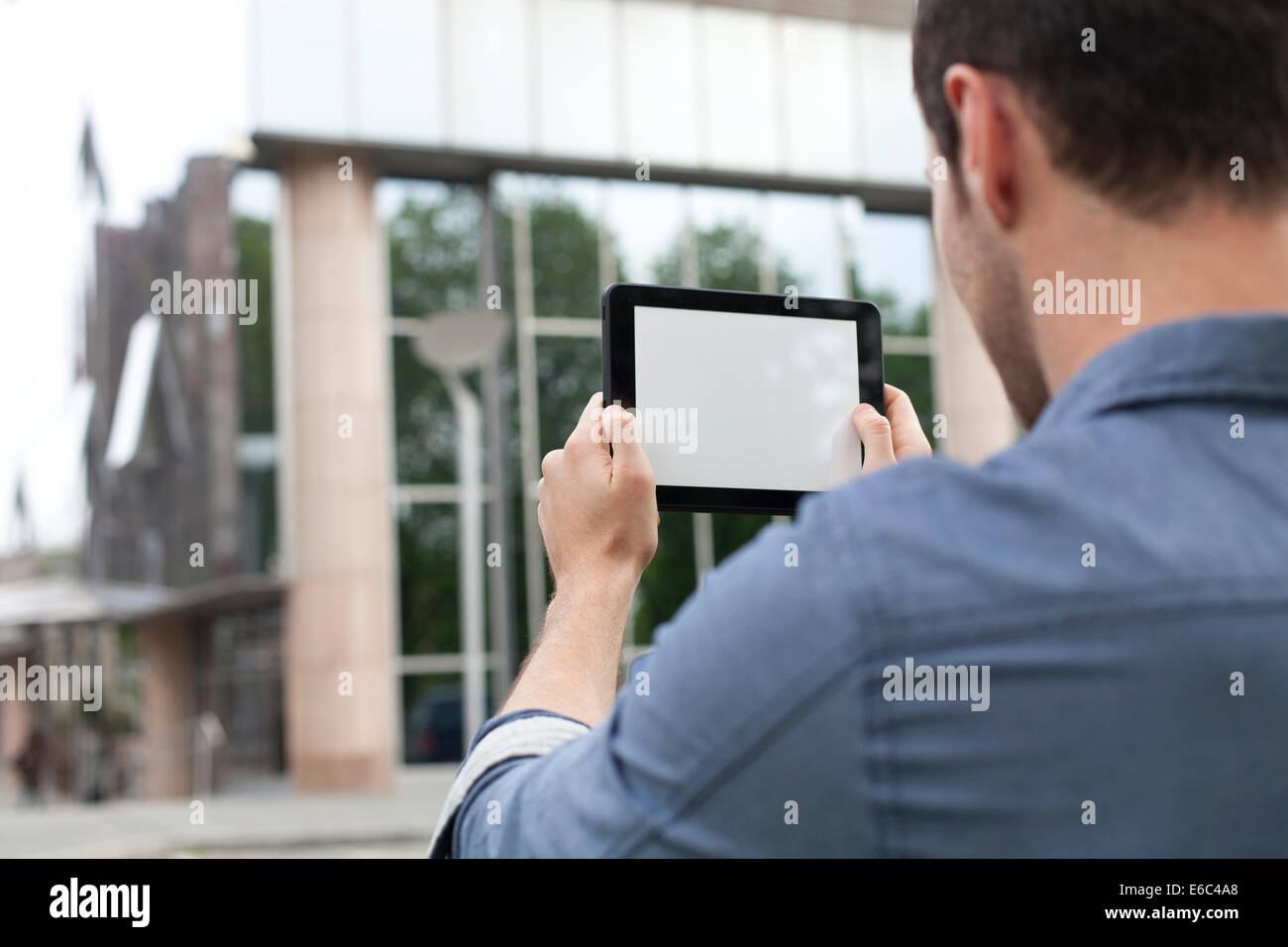 Taking picture with digital tablet Stock Photo - Alamy