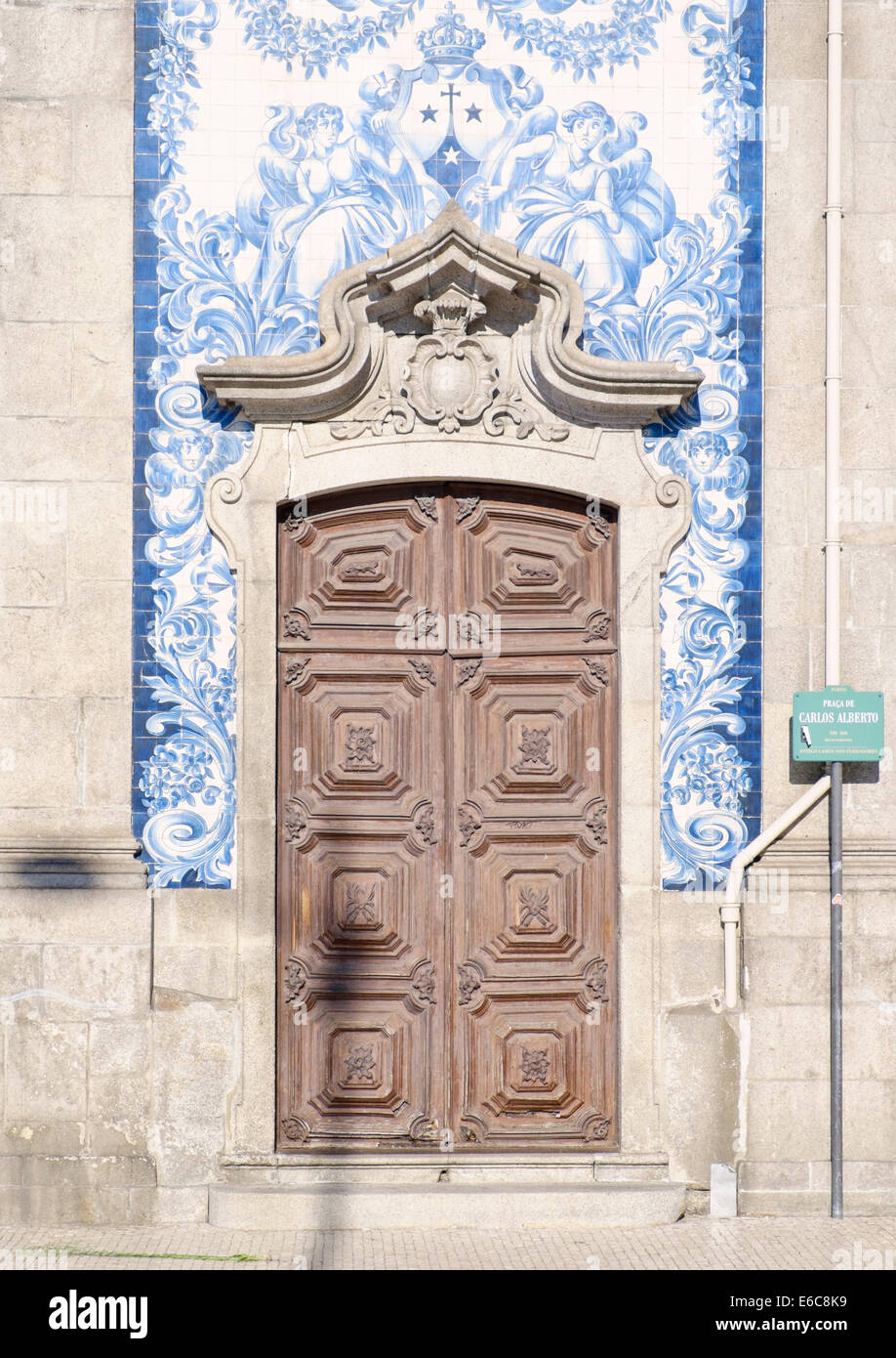 Door surrounded by decorative azulejos tile painting Igreja das ...