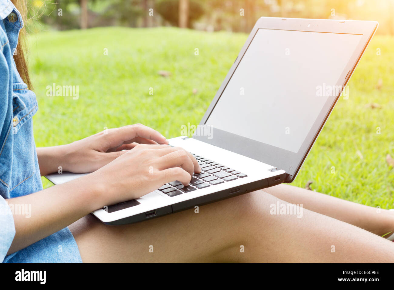 woman use laptop computer in the park Stock Photo - Alamy