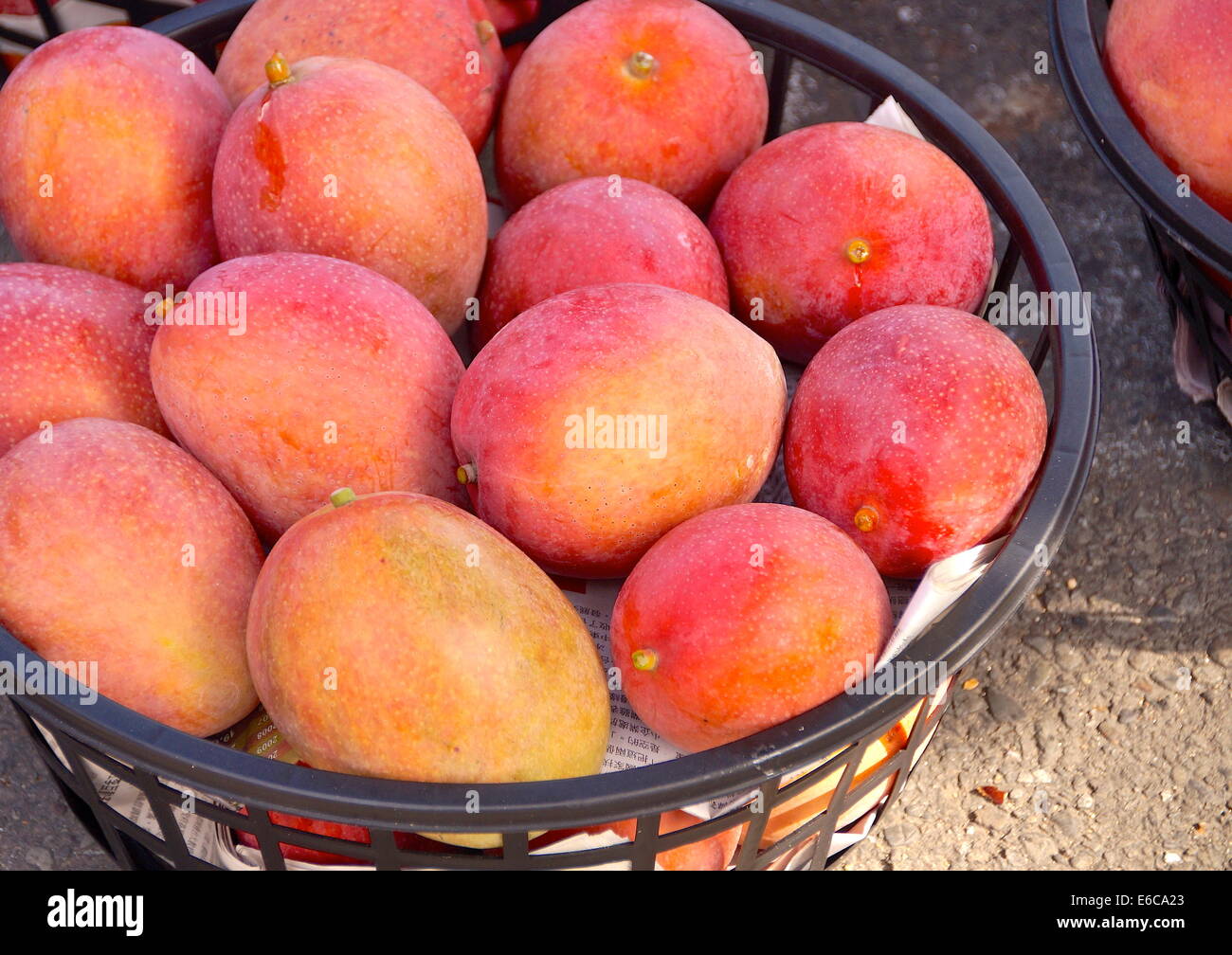 Mango closeup in fruit market Stock Photo - Alamy