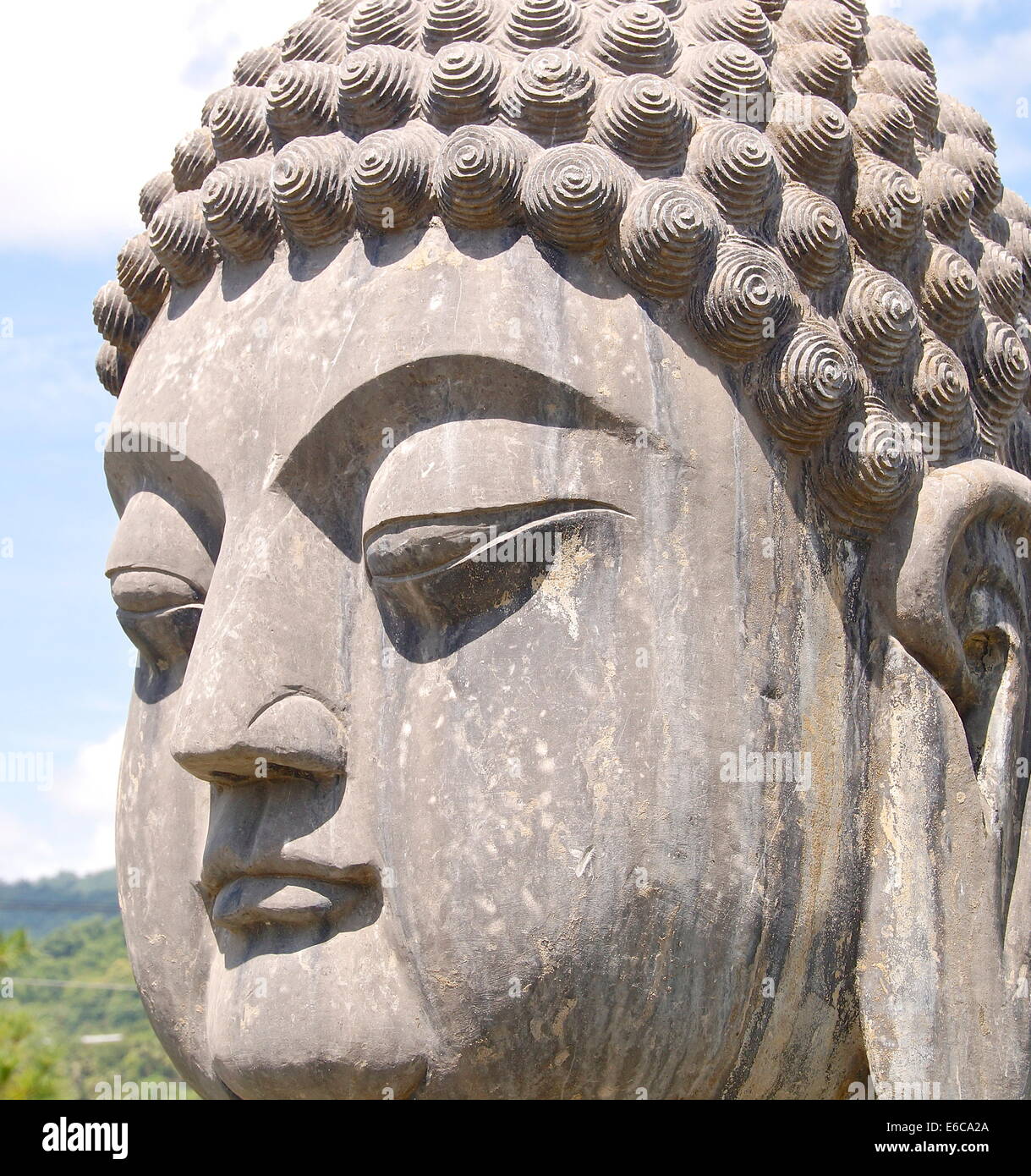 The side view of Buddha's face closeup Stock Photo - Alamy