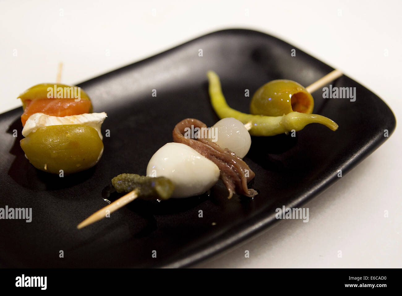 Ingredients and plates mixing modern and Mediterranean flavors Stock ...