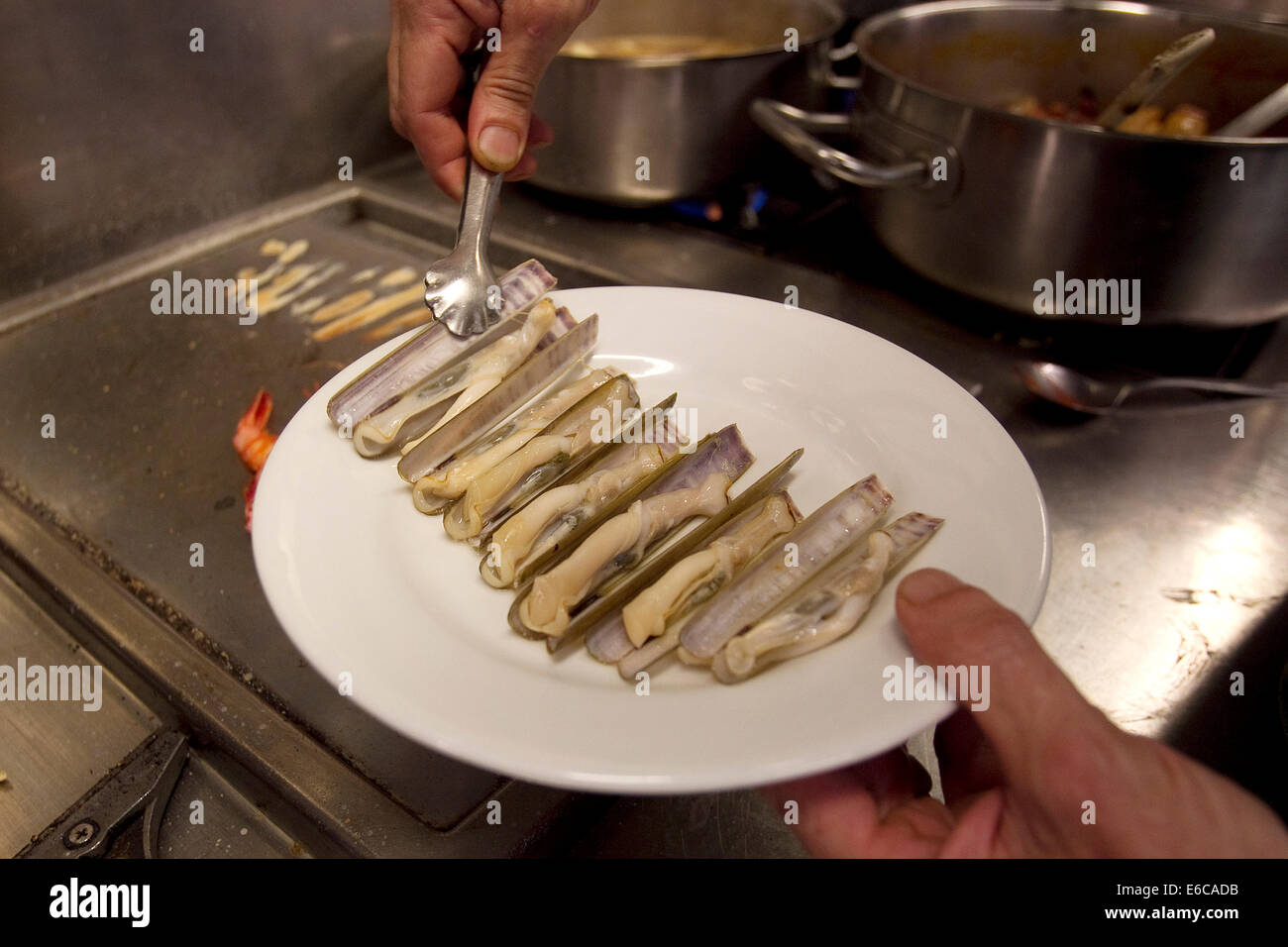 Ingredients and plates mixing modern and Mediterranean flavors Stock ...