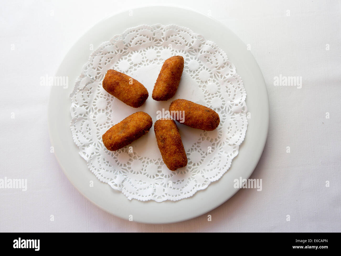 Ingredients and plates mixing modern and Mediterranean flavors Stock ...