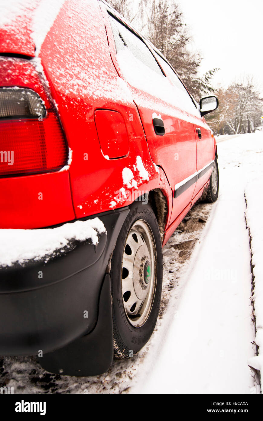 red car under snow Stock Photo - Alamy