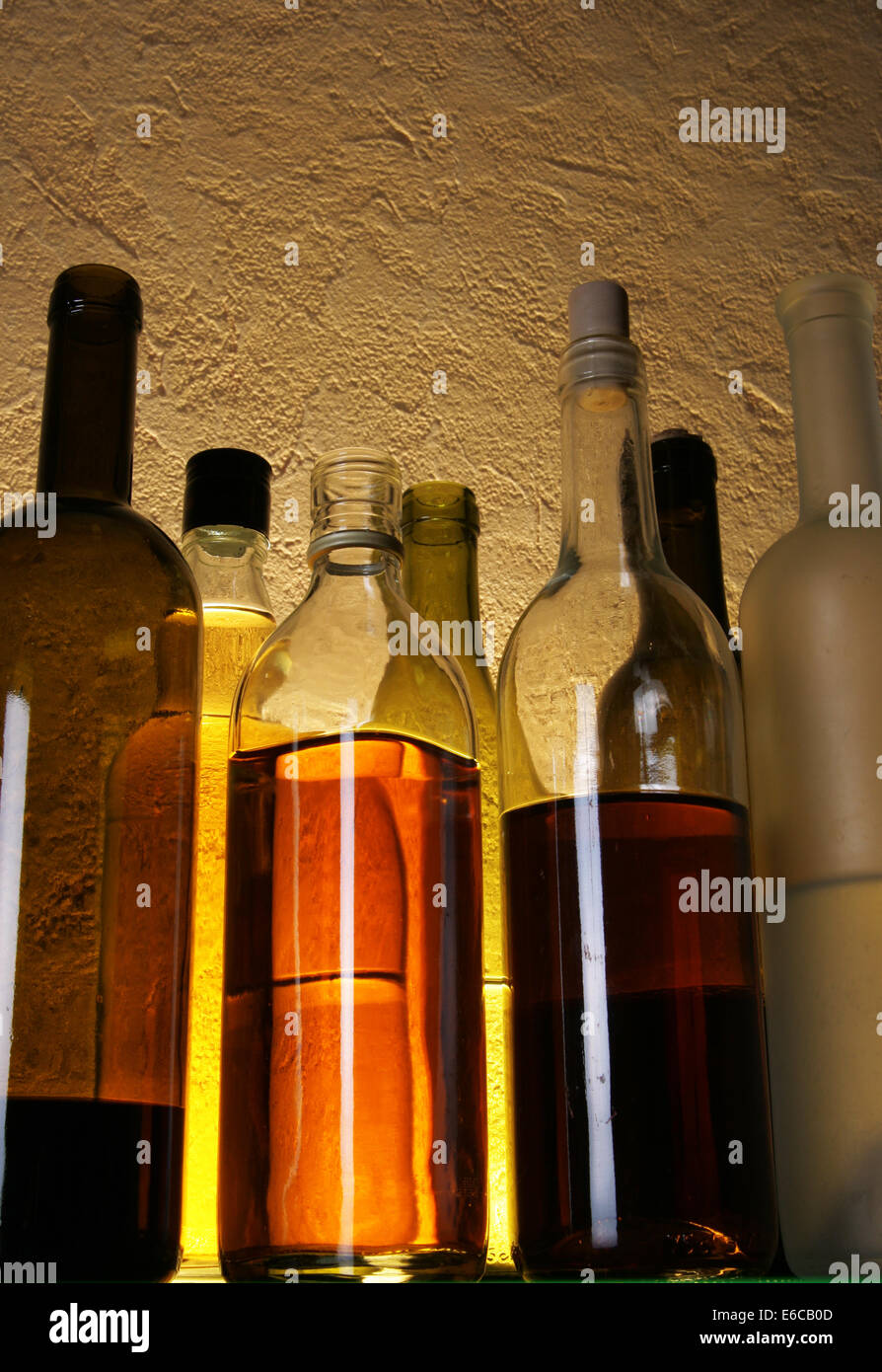Still life with alcoholic drinks over yellow background Stock Photo - Alamy