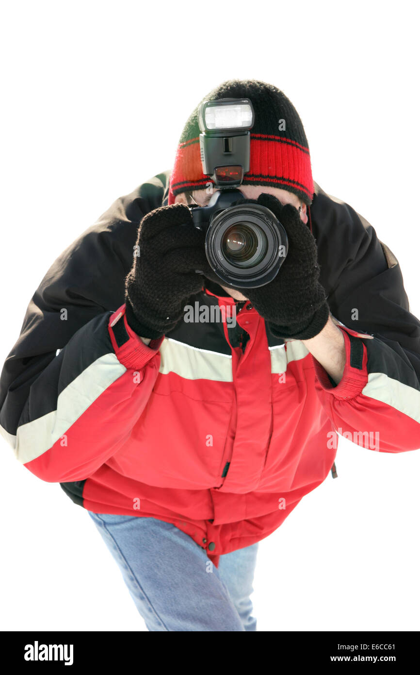 Professional photographer taking a shot isolated over white background ...