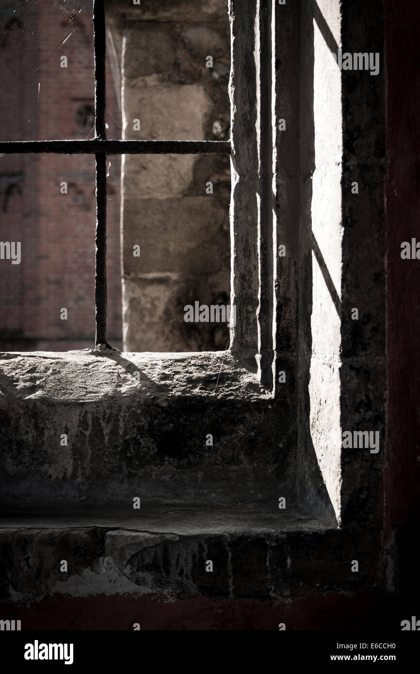 Spooky looking church window Stock Photo - Alamy