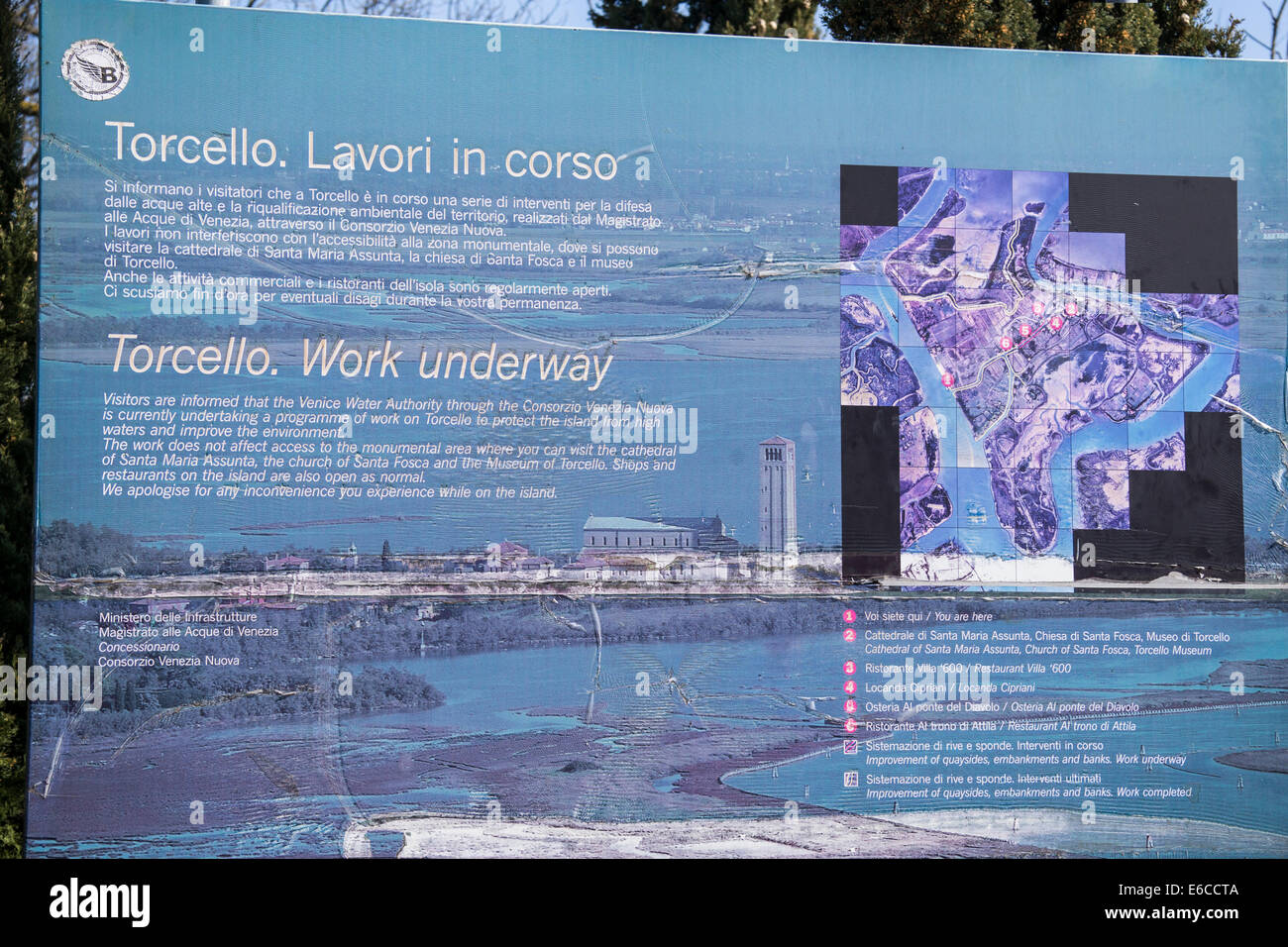 Sign explaining the restorations under way on Torcello Stock Photo - Alamy