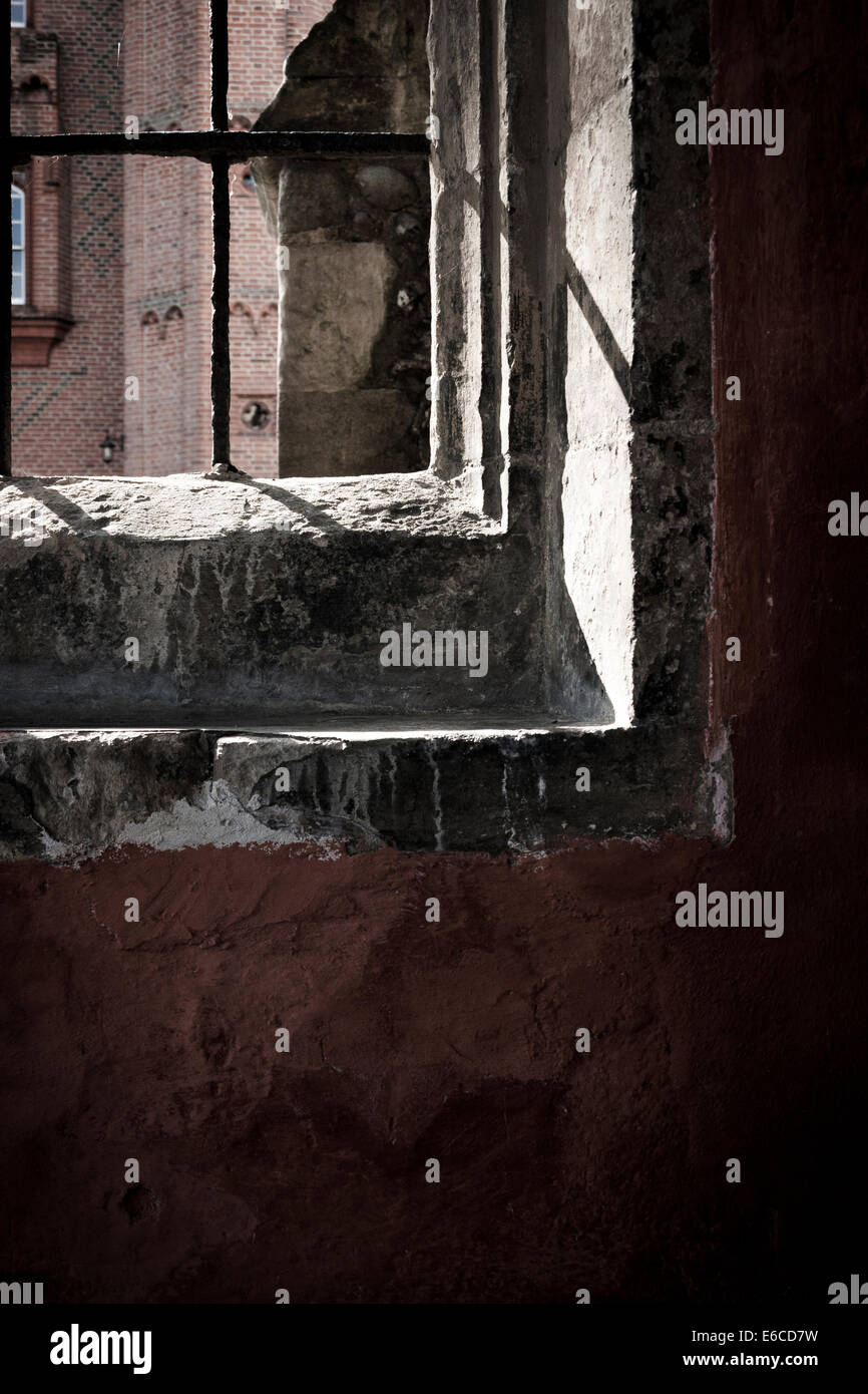 Spooky looking church window Stock Photo - Alamy