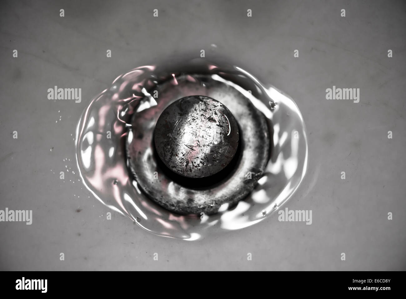 Water going down the drain Stock Photo - Alamy