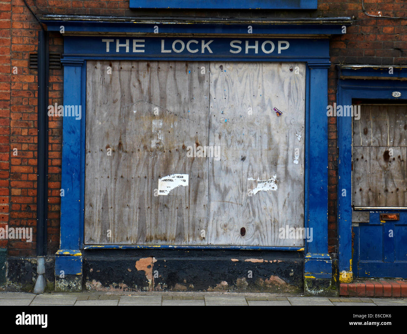 Boarded up shop front in hi-res stock photography and images - Alamy